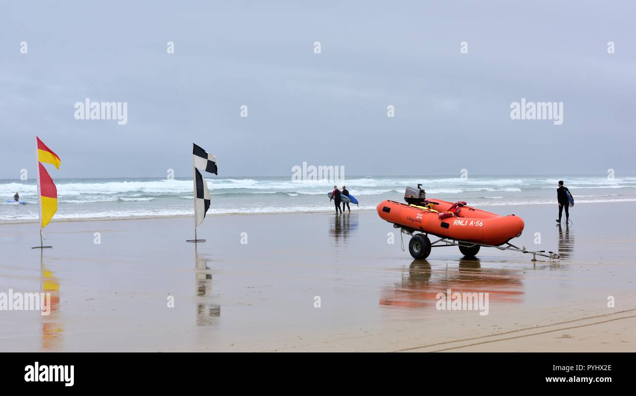 RNLI beach safety flags and inflatable lifeboat,Perranporth Beach ...