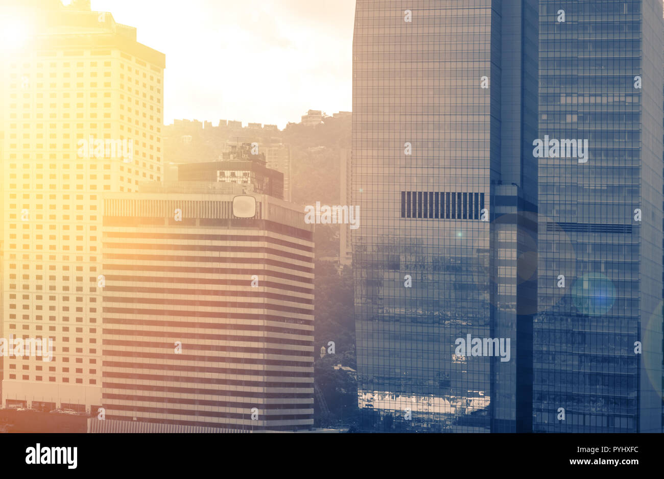 Hong Kong Cityscraper with sun ray Stock Photo - Alamy