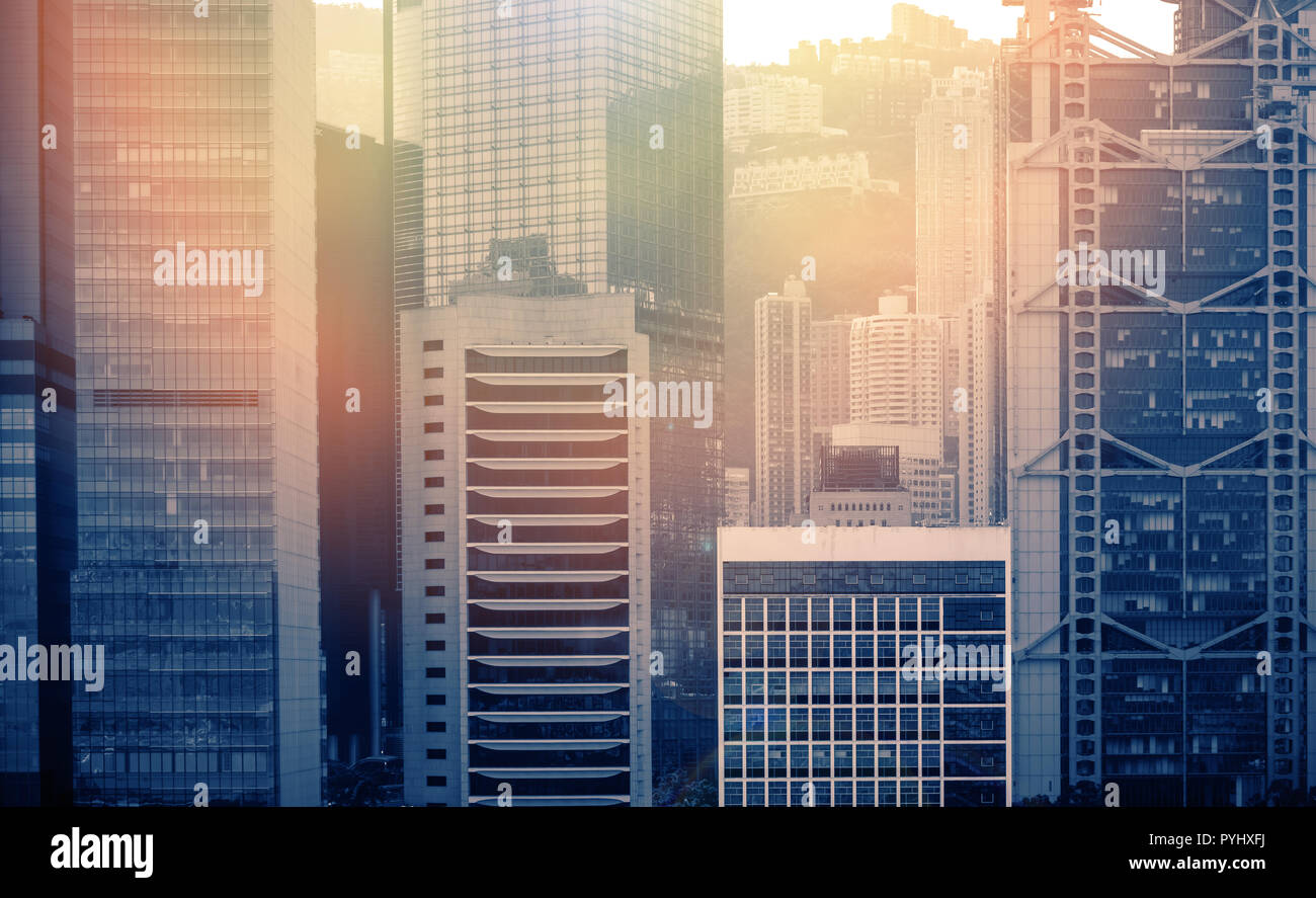 Hong Kong Cityscraper with sun ray Stock Photo - Alamy