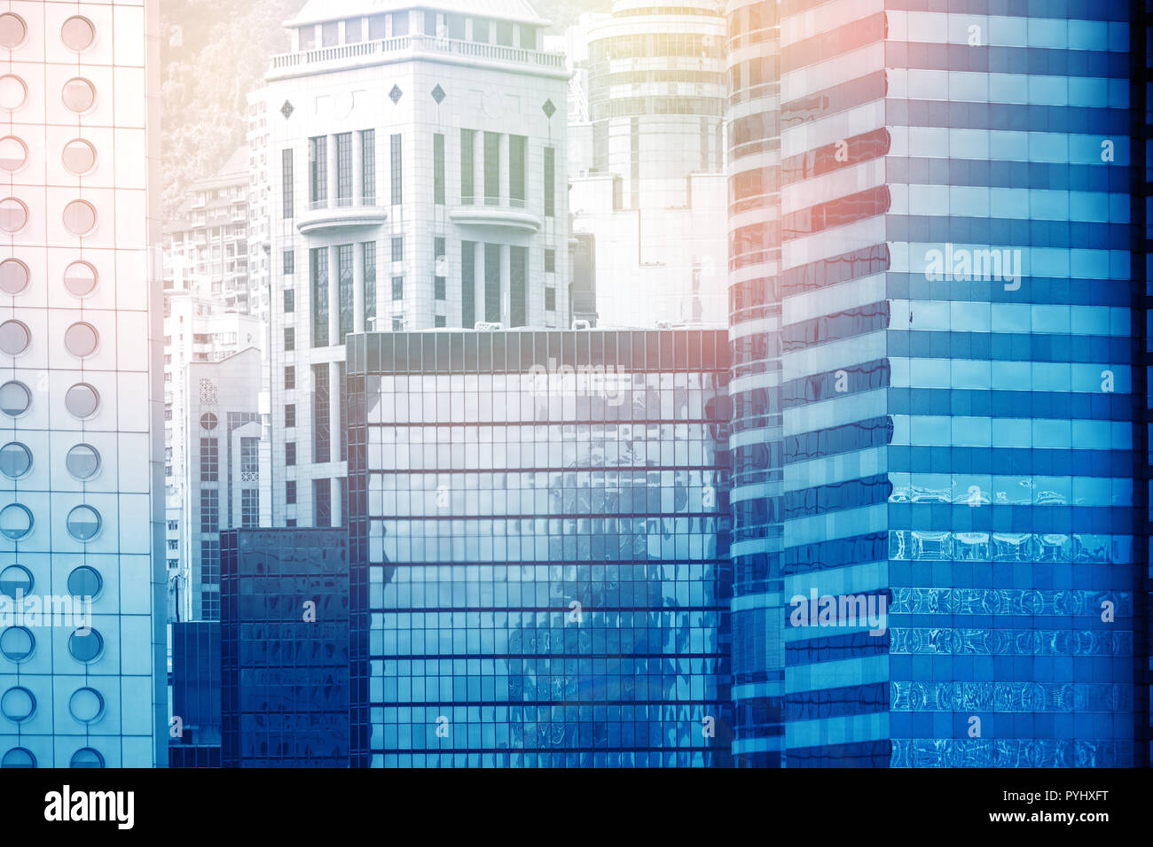 Hong Kong Cityscraper with sun ray Stock Photo - Alamy