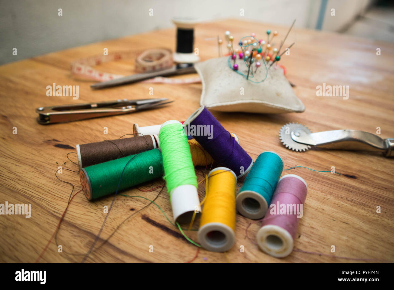 Tailors table thread tape hi-res stock photography and images - Alamy