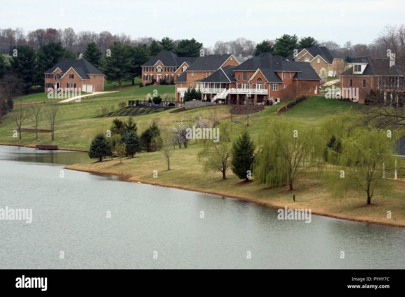 New, large homes in residential complex by the lake. Virginia, USA ...