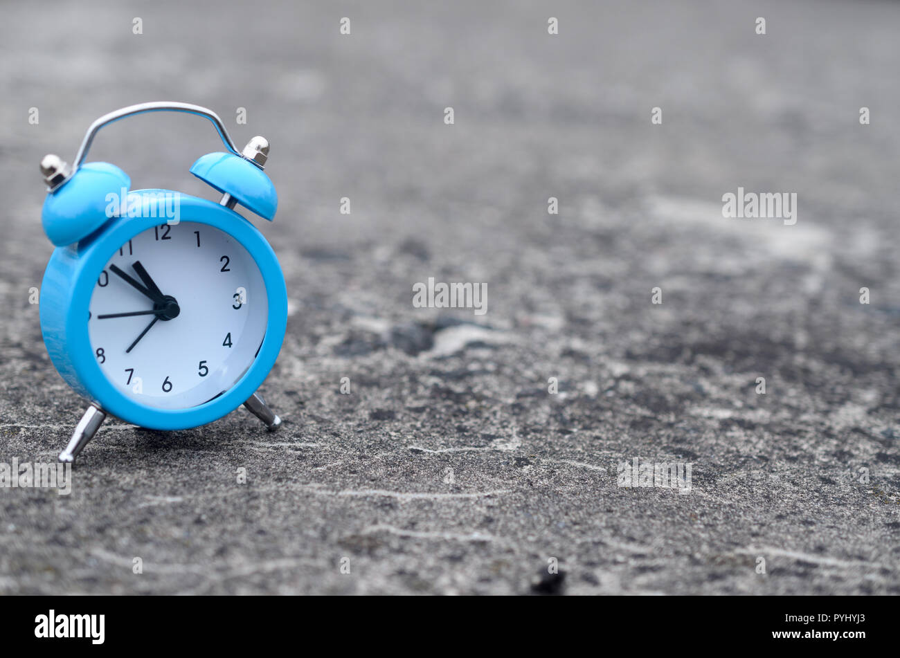 Blue alarm clock stands hi-res stock photography and images - Alamy
