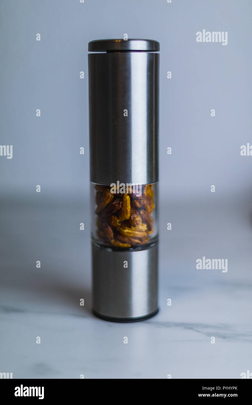 chrome chili mill with a window, so you can see the chili inside, on a ...