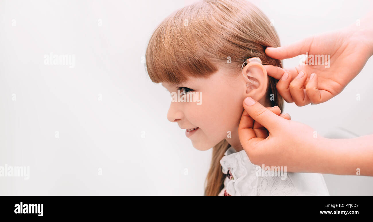 Hearing aid child hi-res stock photography and images - Alamy