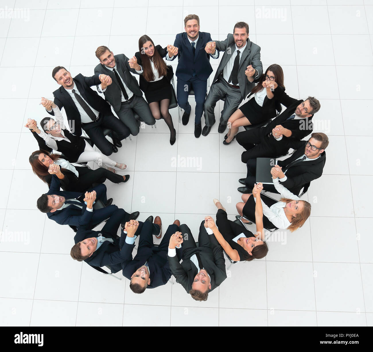 concept of team building.large business team sitting in a circle Stock ...
