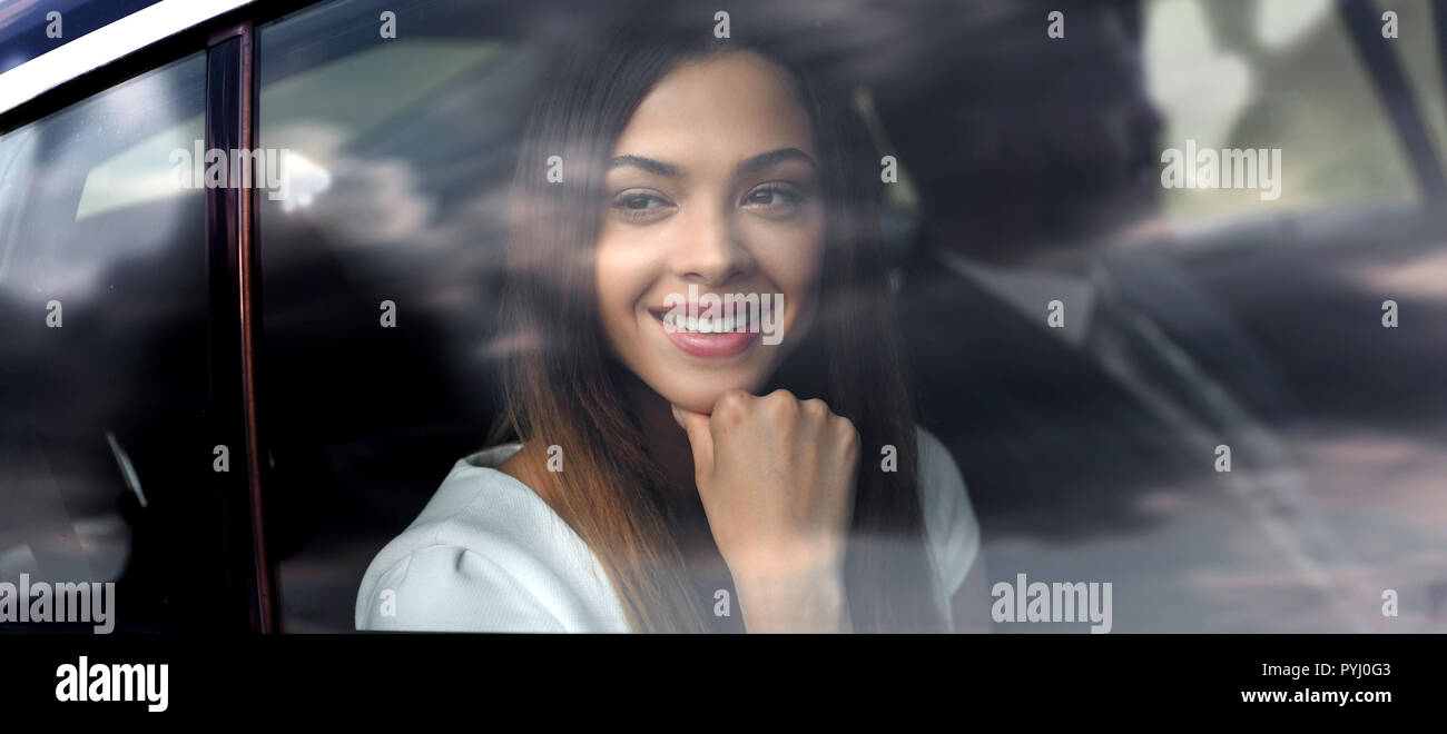 thoughtful business woman sitting in car backseat Stock Photo - Alamy thoughtful business woman sitting in car backseat Stock Photo - Alamy