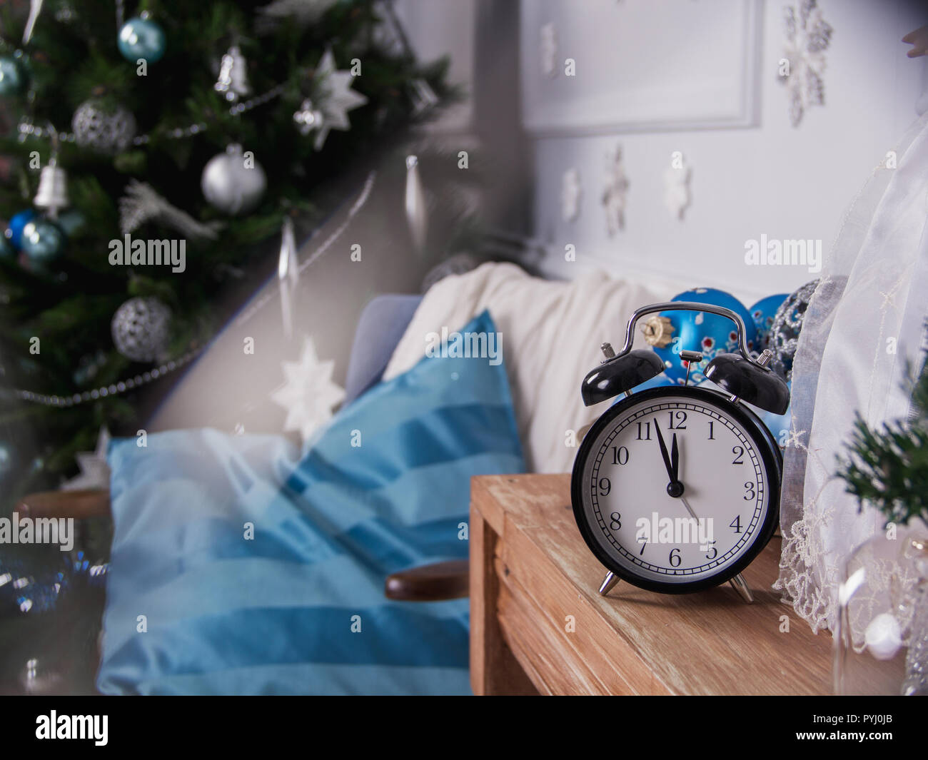The clock at five minutes to twelve Stock Photo - Alamy