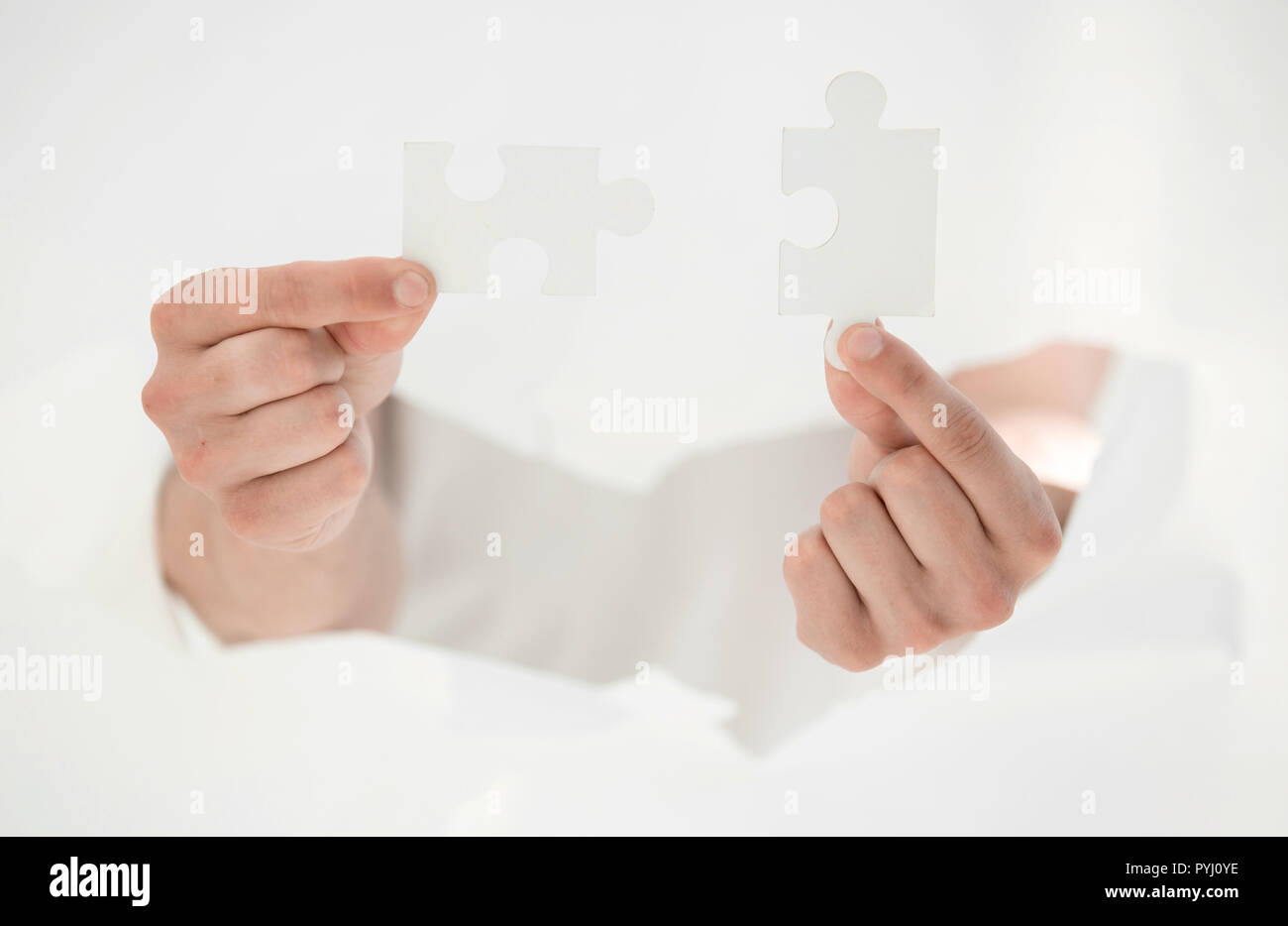 Hands breaking through wall hi-res stock photography and images - Alamy