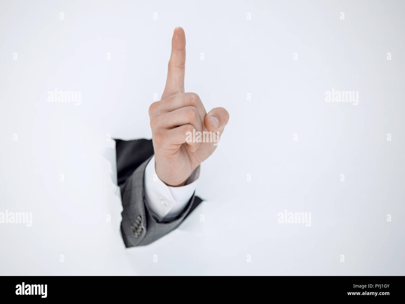 businessman hand showing a gesture of warning Stock Photo - Alamy