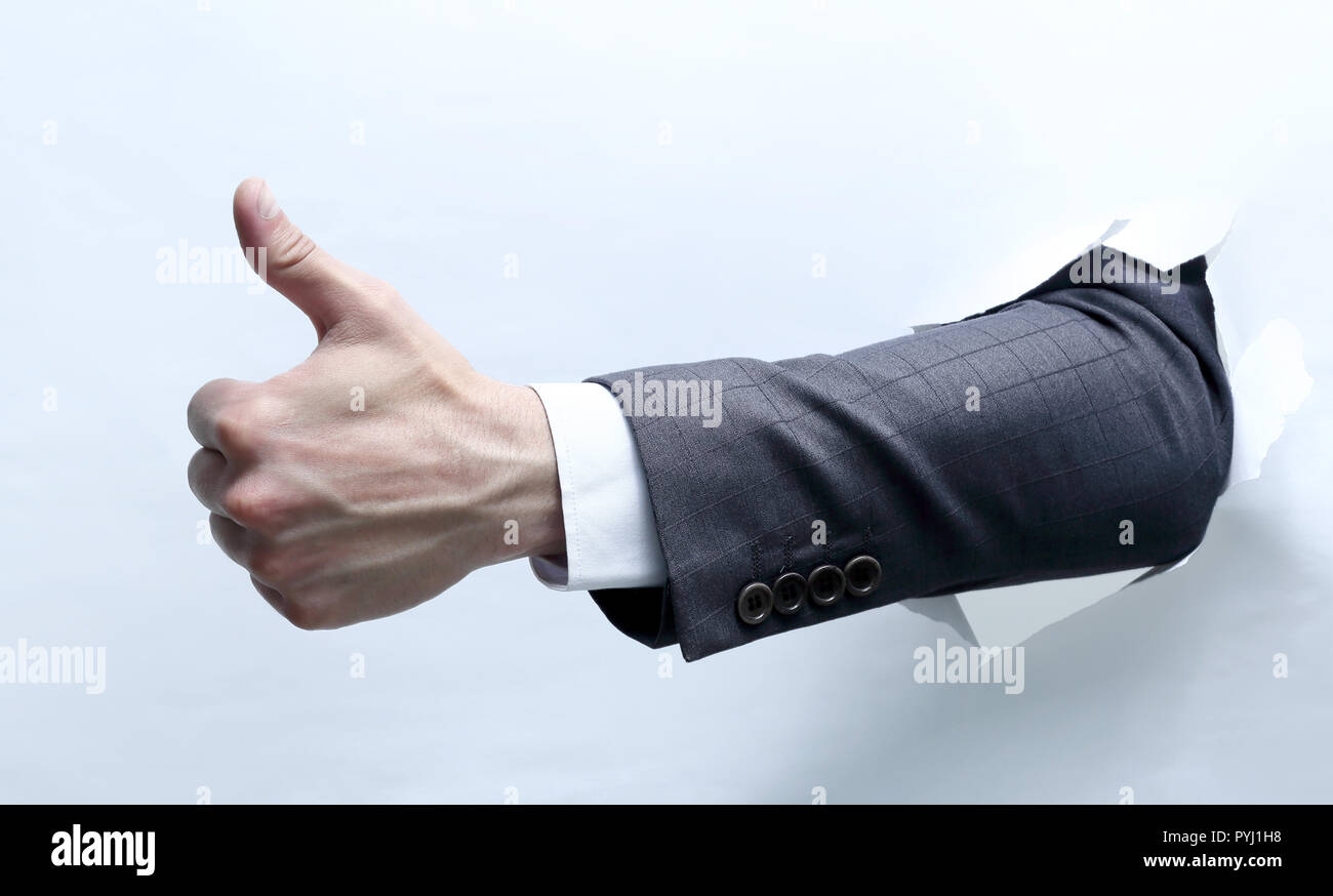 man's hand with a thumbs up gesture Stock Photo - Alamy