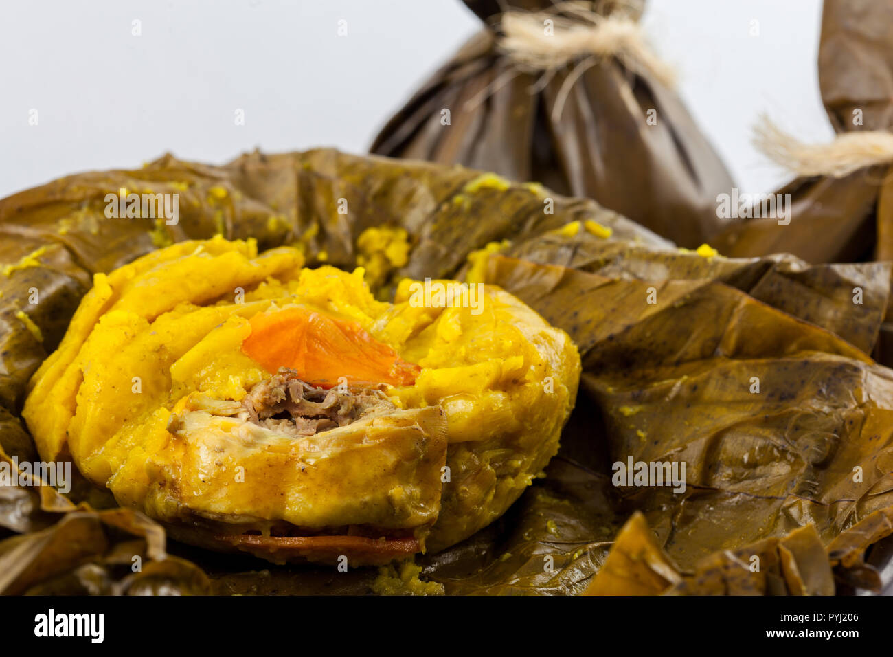 Traditional Colombian tamale as made on Tolima region isolated on white ...