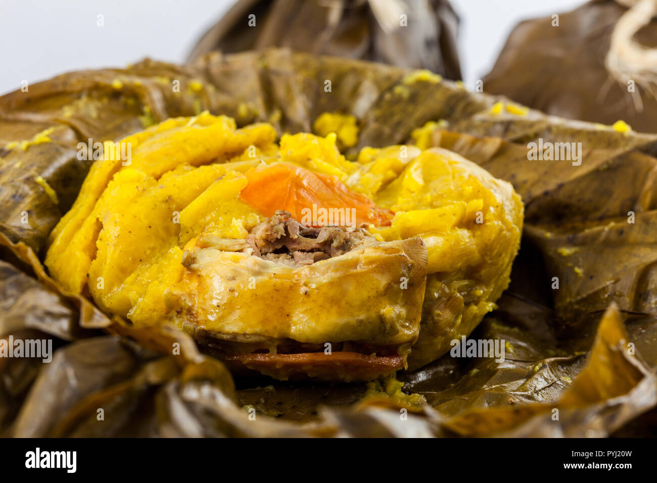 Traditional Colombian tamale as made on Tolima region isolated on white ...
