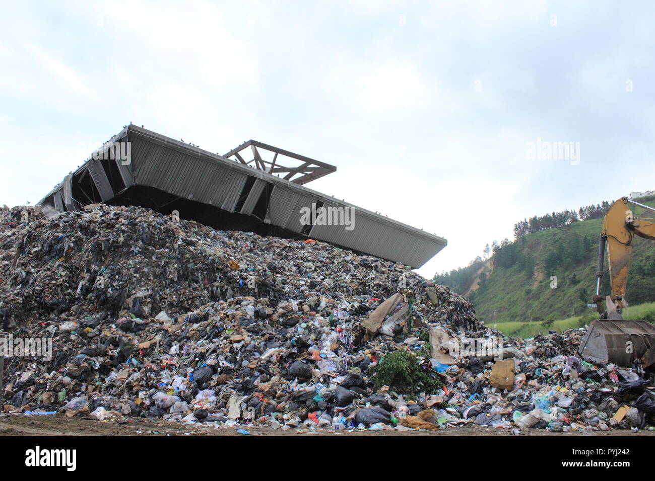 Garbage at collapsed waste plant contamination concept Stock Photo - Alamy