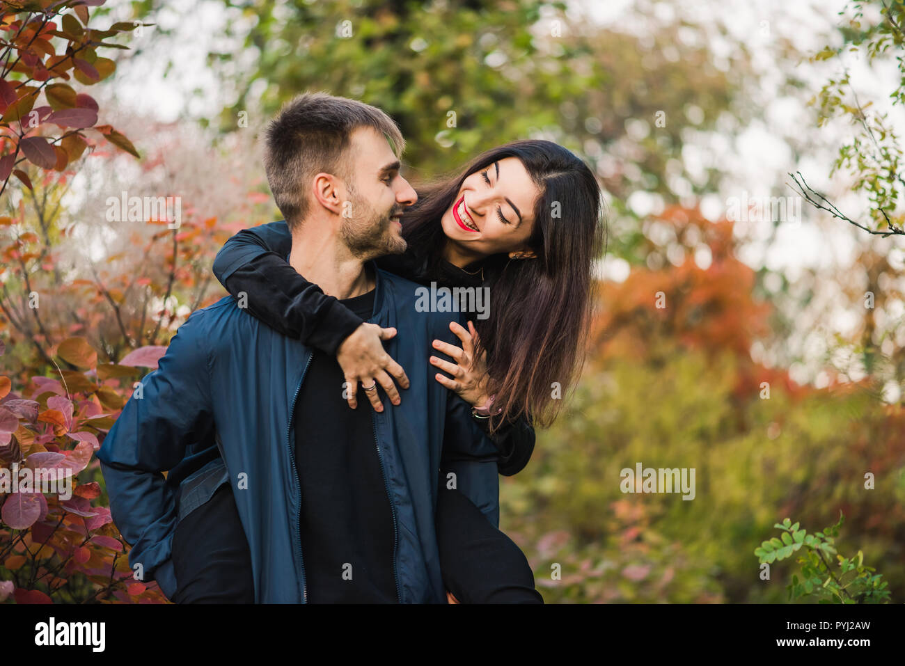 Woman cuddles man hi-res stock photography and images - Alamy