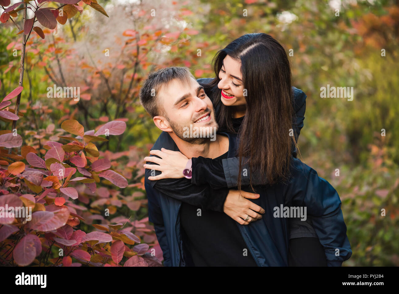 Woman cuddles man hi-res stock photography and images - Alamy