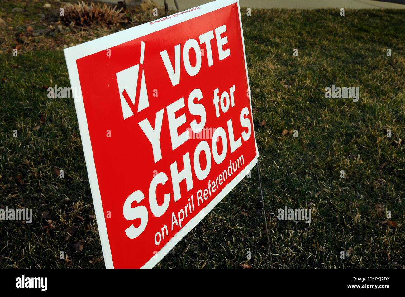A yard sign urging the public to vote a school election referendum in ...