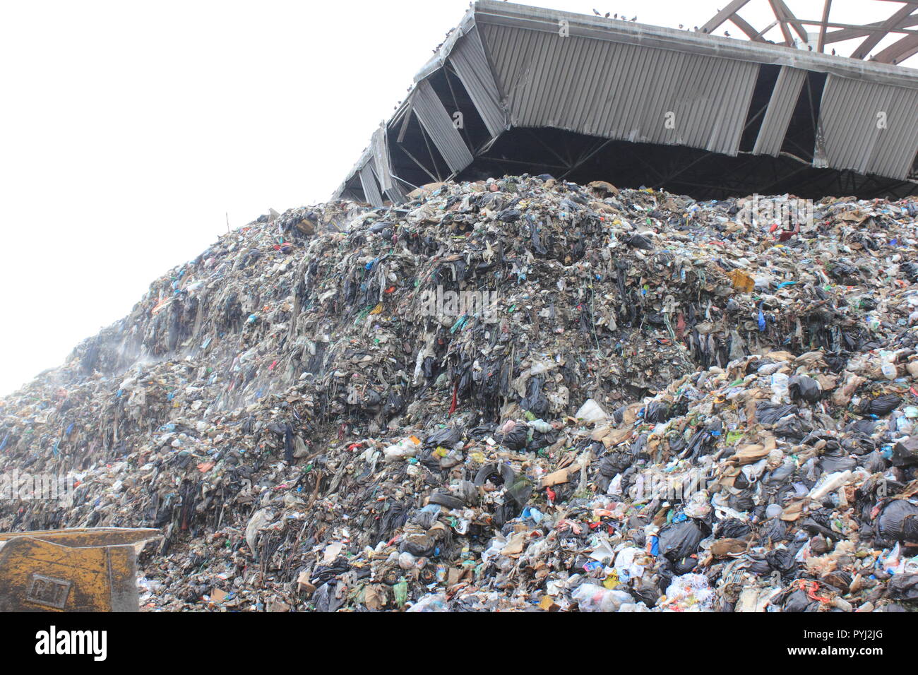 Garbage at collapsed waste plant contamination concept Stock Photo - Alamy