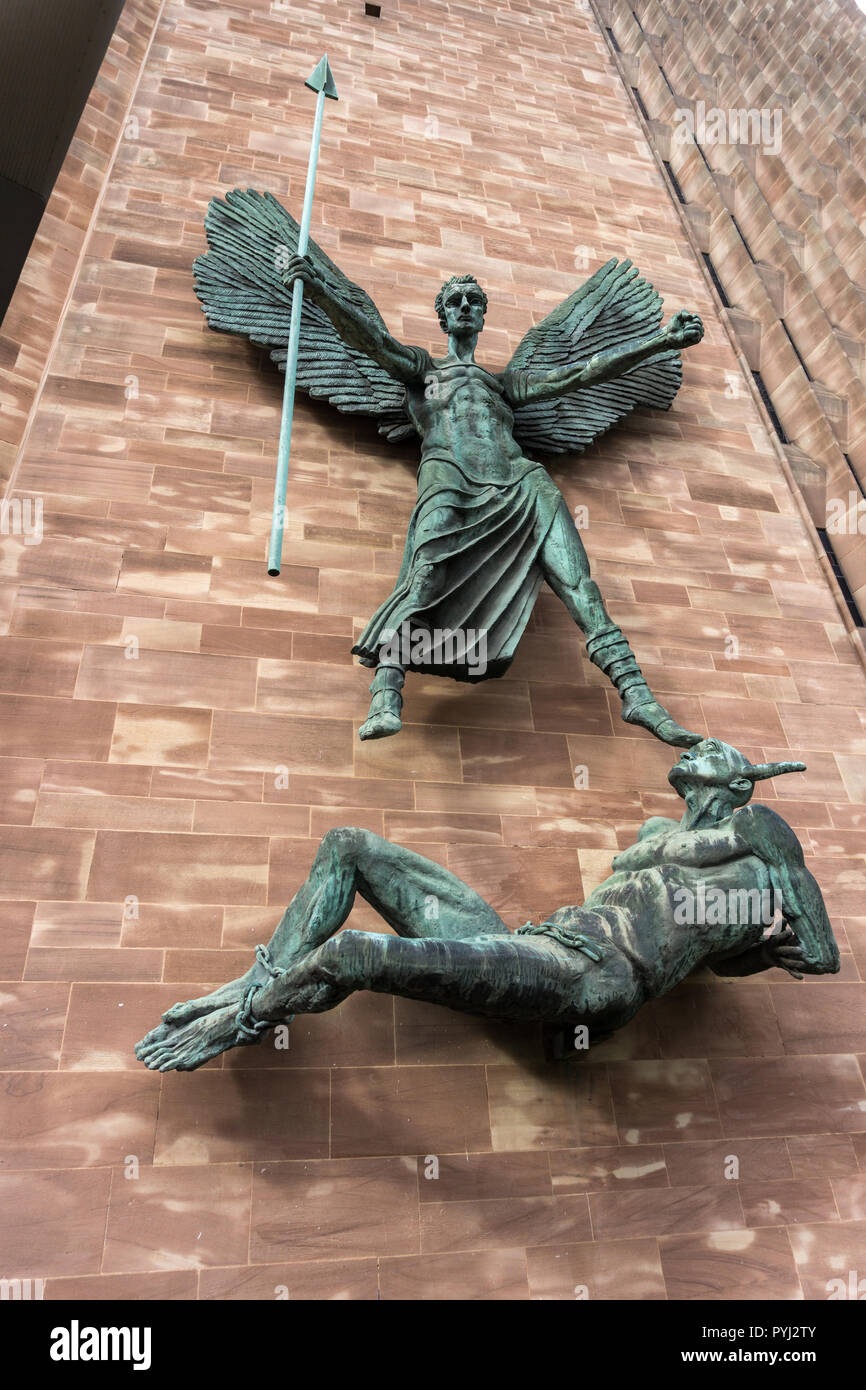 Bronze sculpture, St Michael's Victory Over The Devil, by the entrance ...