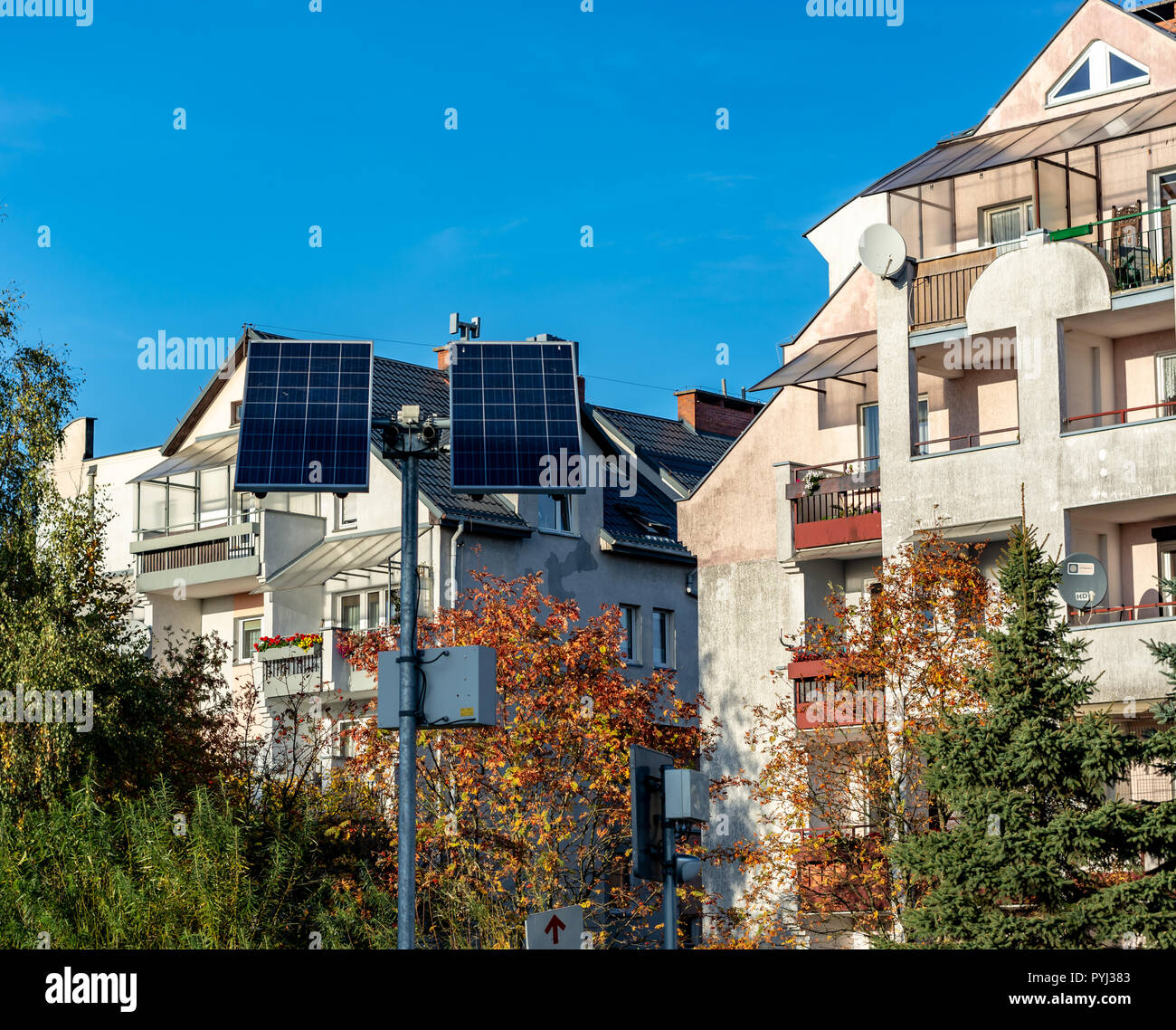 solar panels on the background of residential houses Stock Photo - Alamy