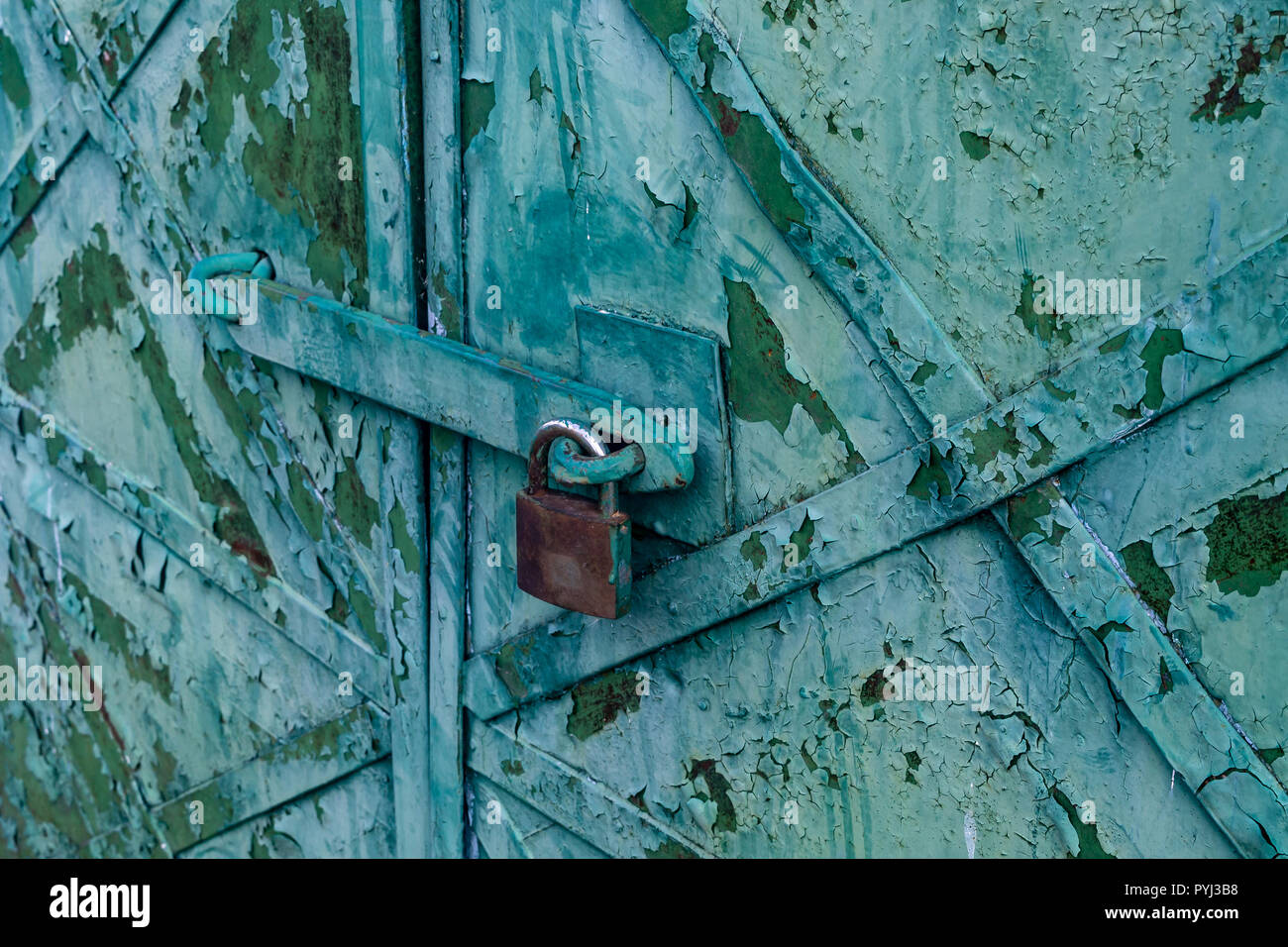old steel door with lock and key Stock Photo - Alamy