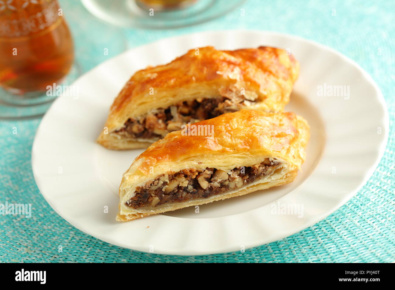Turkish sweet pastry baklava with nuts and tea Stock Photo - Alamy