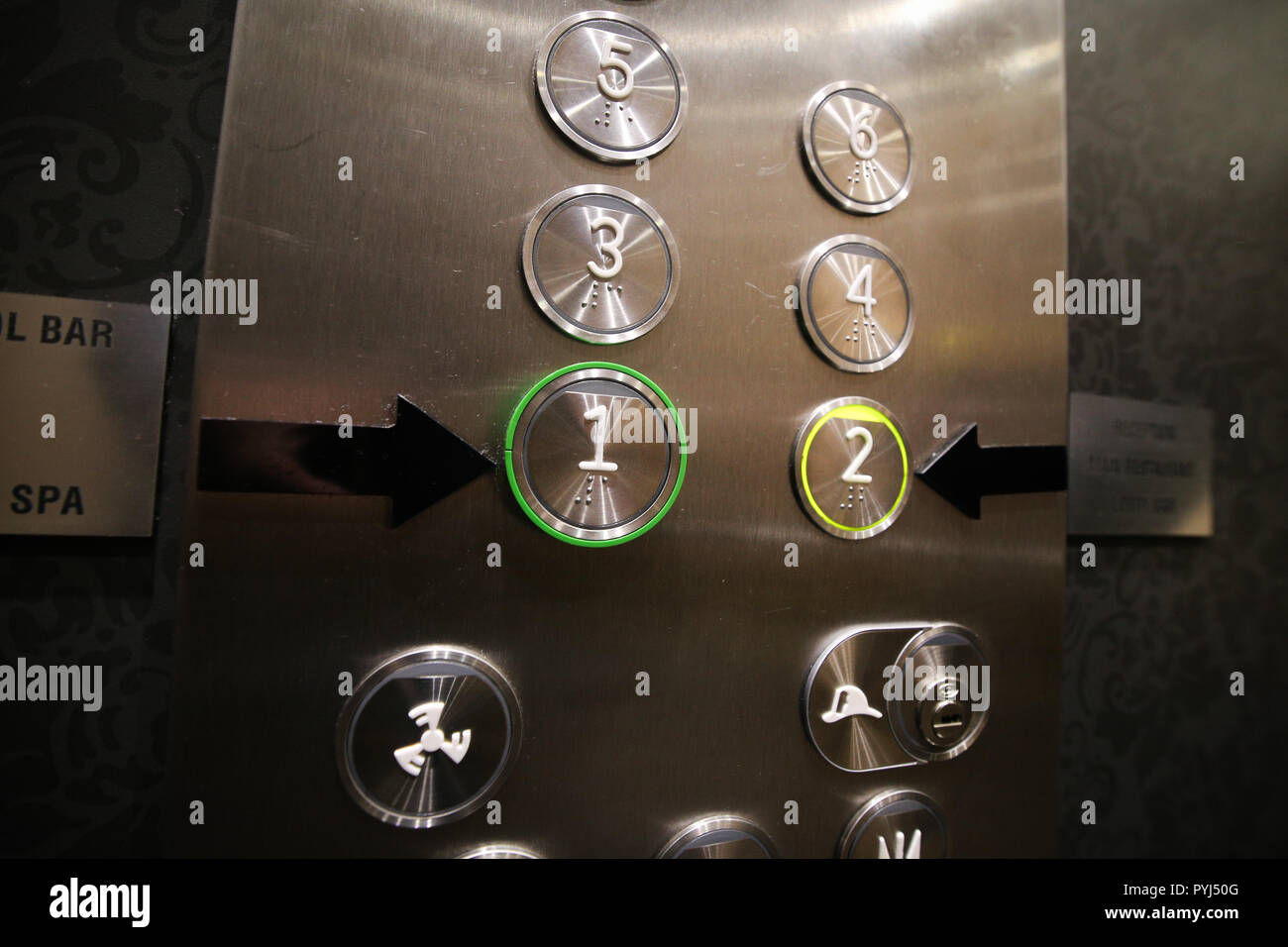 Details with the braille floor buttons on a modern elevator in a luxury ...