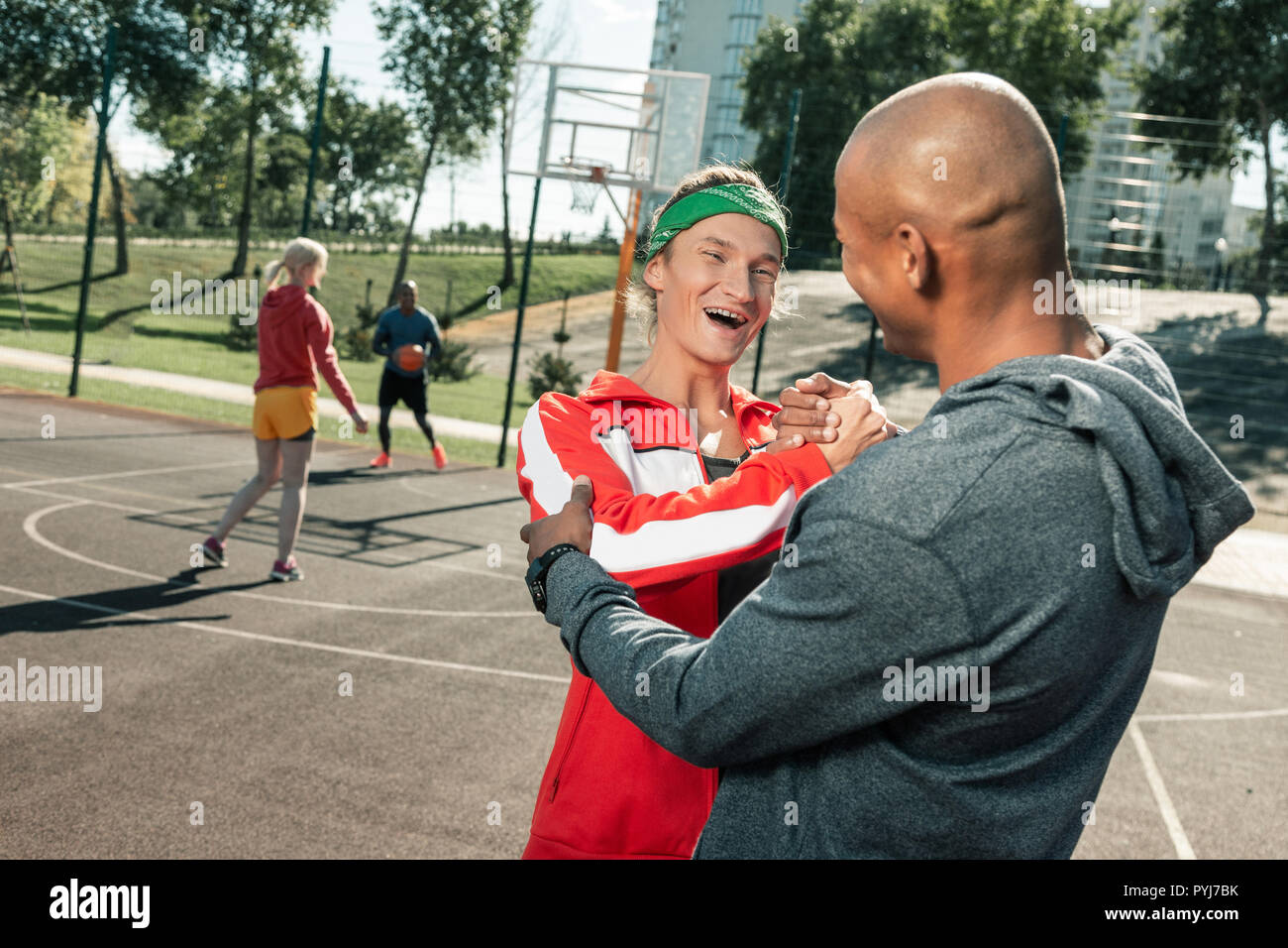 Friends Greeting Each Other Stock Photos & Friends Greeting Each Other ...