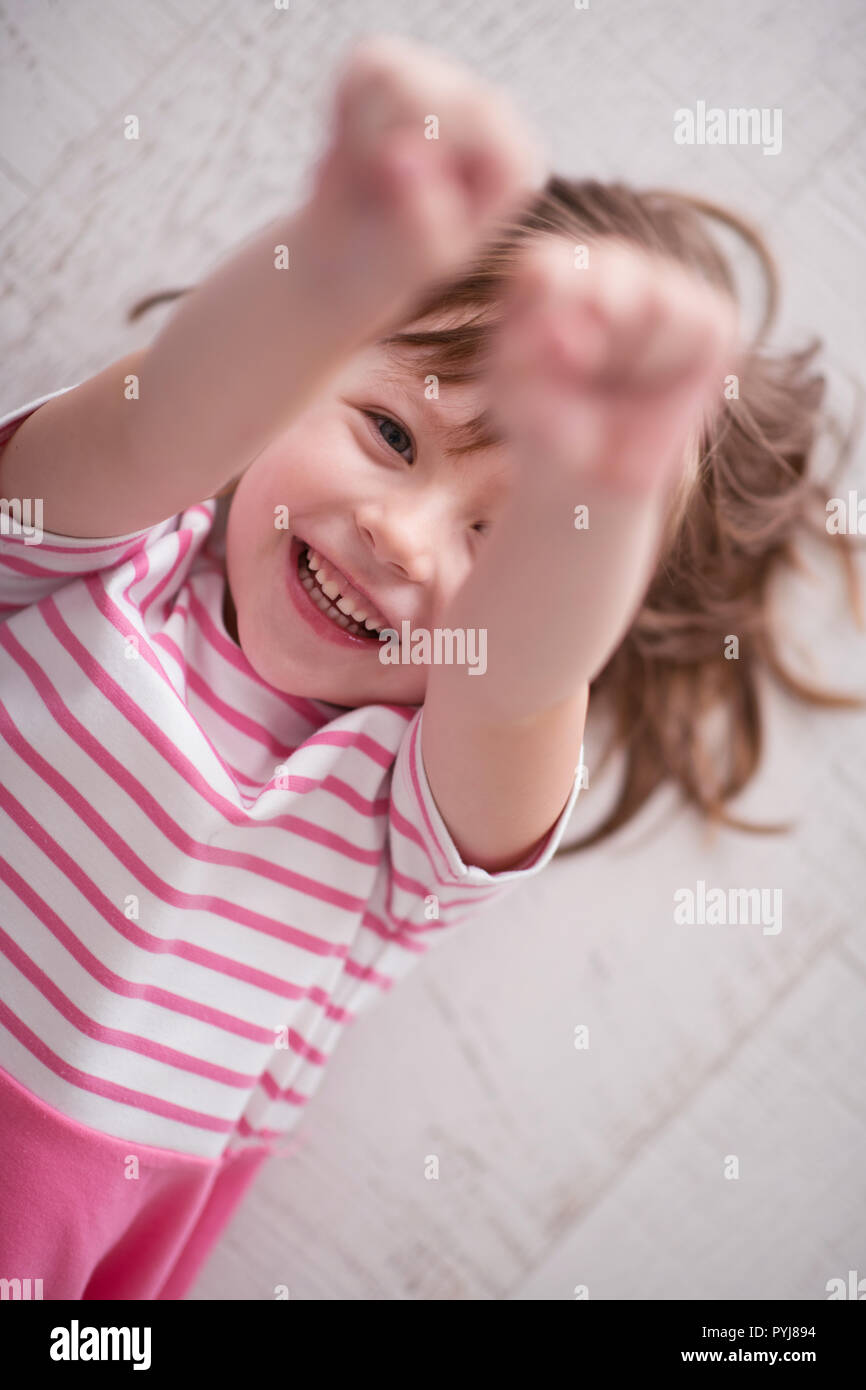 portrait of happy smiling child at home while playing Stock Photo - Alamy