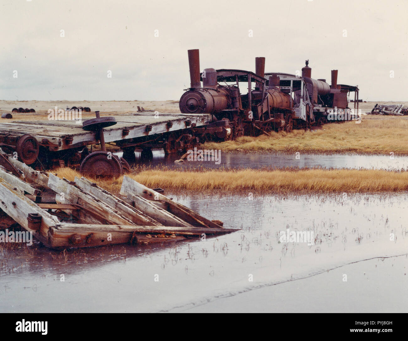 September 1972 - Old abandoned railroad engine near abandoned village ...