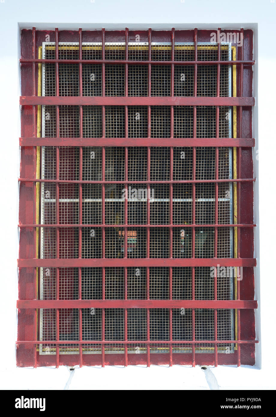 Metal barred or grated security installed on window Stock Photo - Alamy