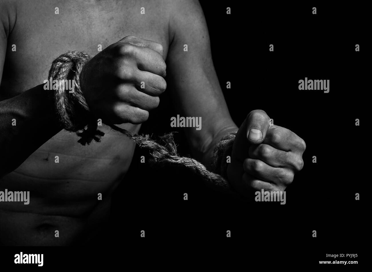 Rope handcuffs hi-res stock photography and images - Alamy