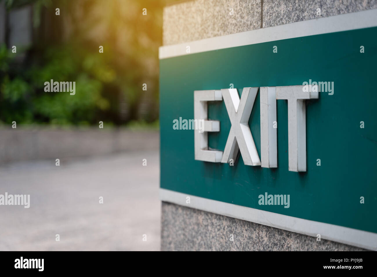 Closeup exit door Emergency Fire exit sign in condo Stock Photo - Alamy