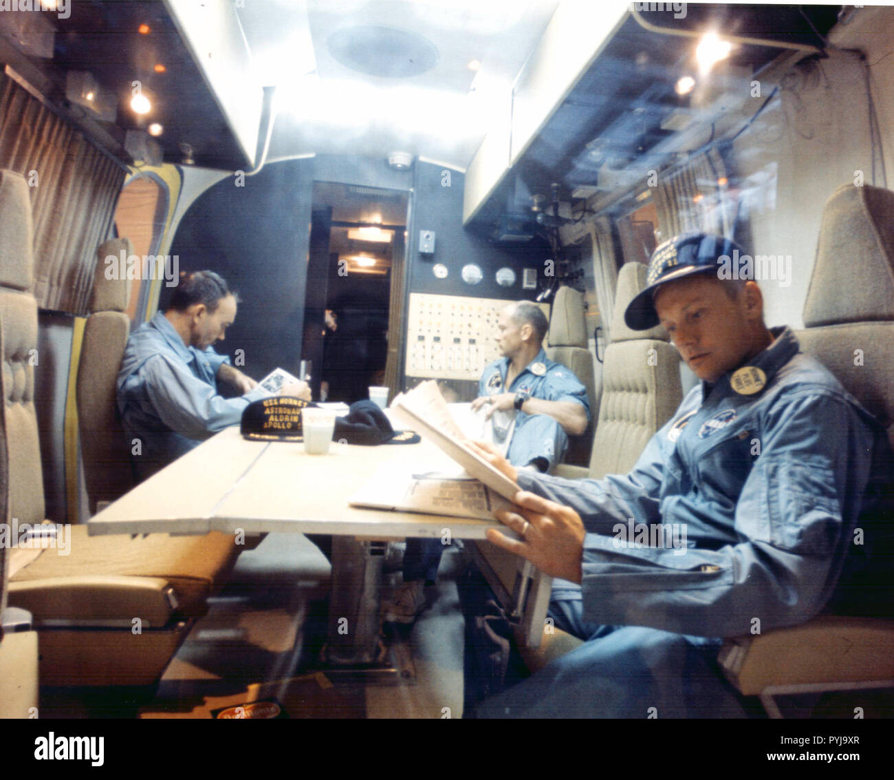 Within the Mobile Quarantine Facility, Apollo 11 astronauts (left to ...