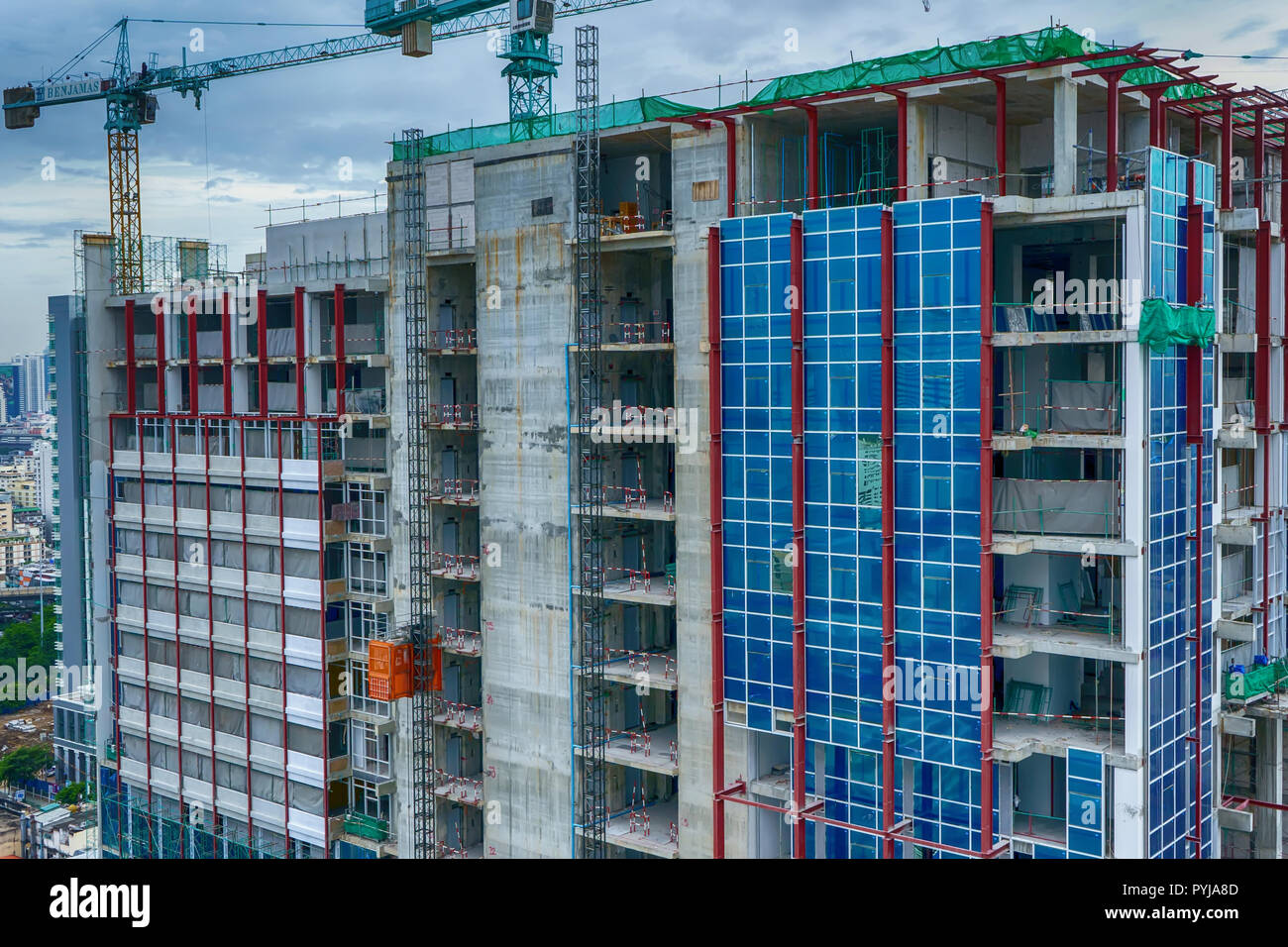 The construction of large buildings in the city Stock Photo - Alamy