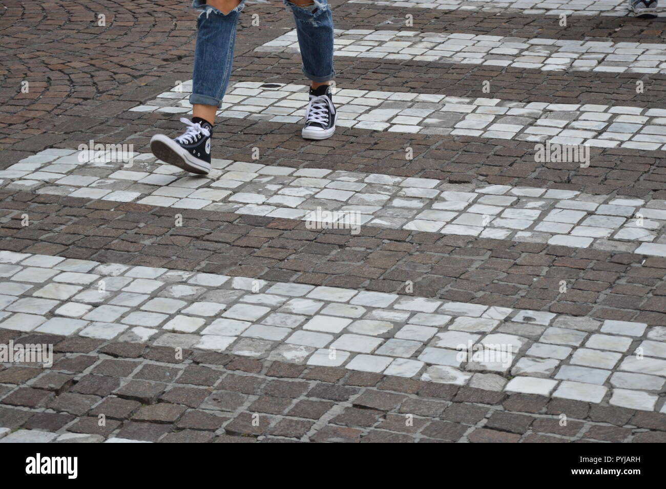 Zoom on a Crosswalk in a City (legs and shoes Stock Photo - Alamy