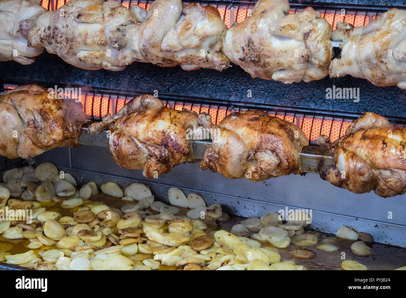Rotisserie chickens france hi-res stock photography and images - Alamy