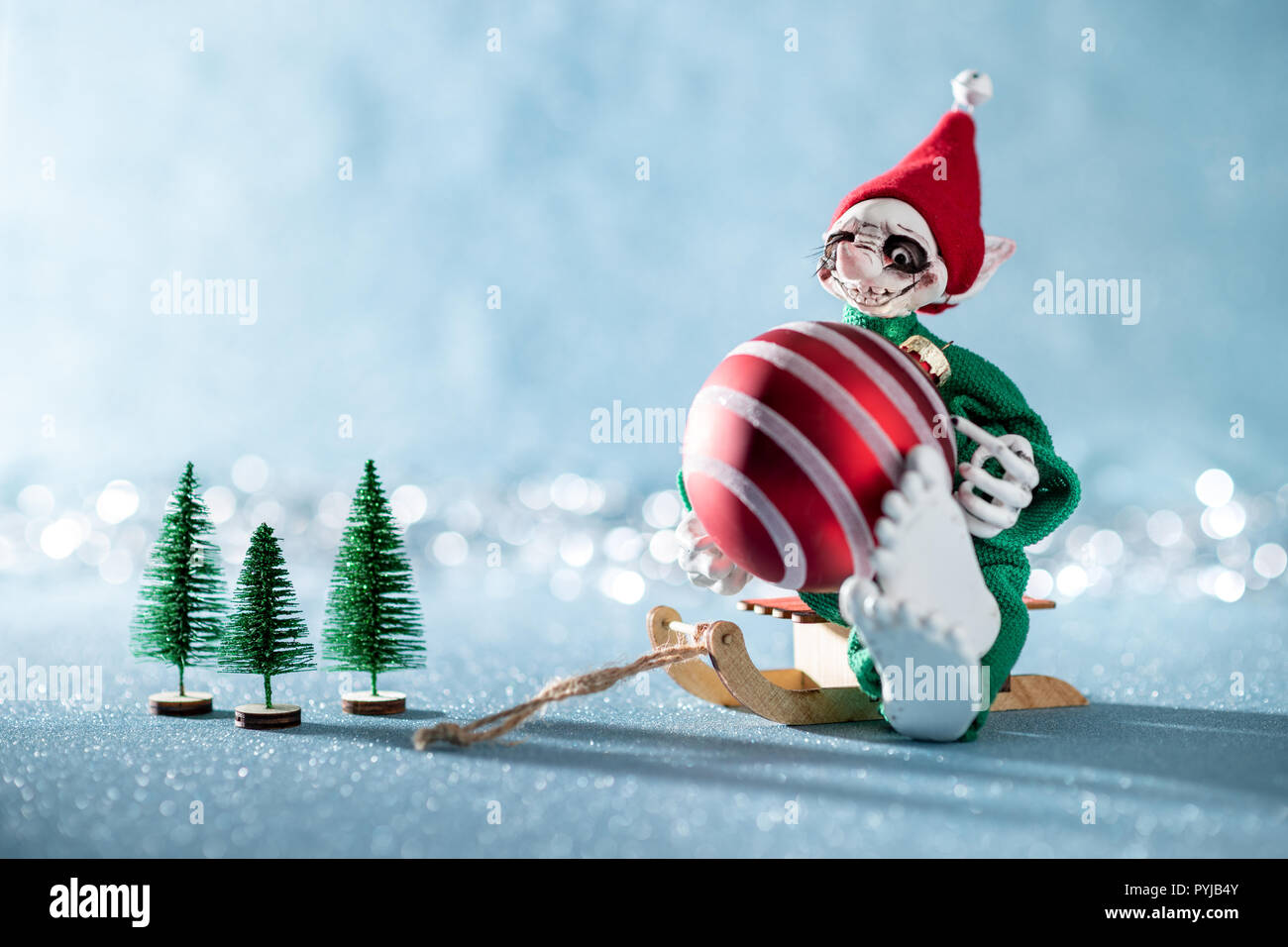 Cute Cheerful Santas Helper Elf Sitting on Santas Sleigh With Christmas ...