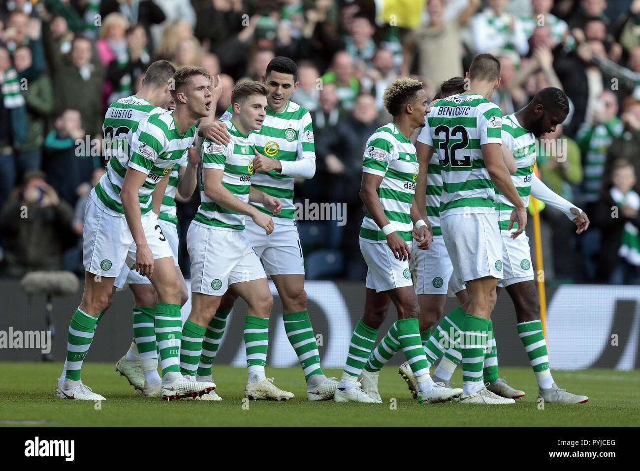 Celtic's James Forrest (third left) celebrates scoring their second ...