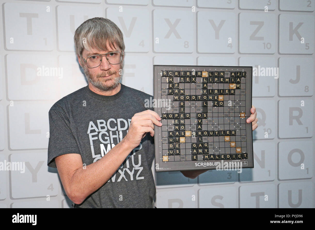 Scrabble World Champion Nigel Richards from New Zealand displays the ...