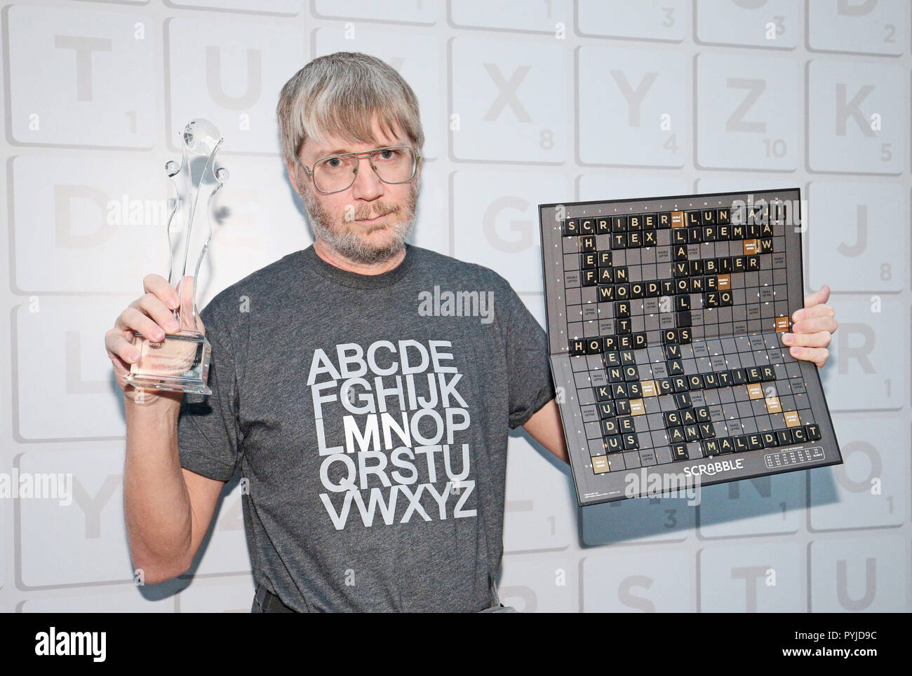 Scrabble World Champion Nigel Richards from New Zealand displays the ...