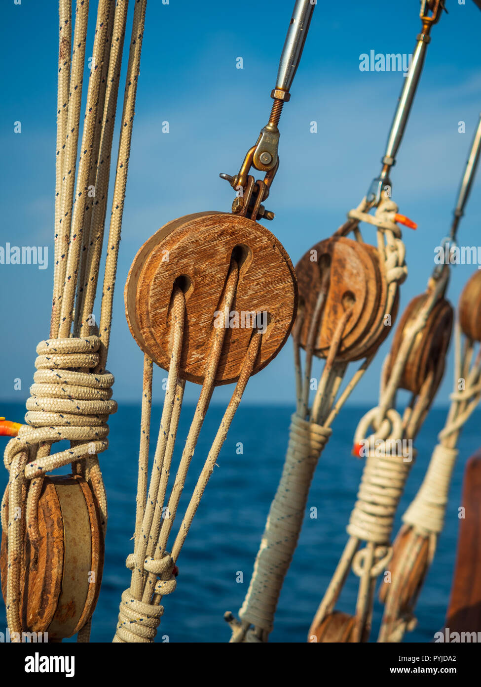 Old ship tackles. Old sailing ship vessel. Background Stock Photo - Alamy