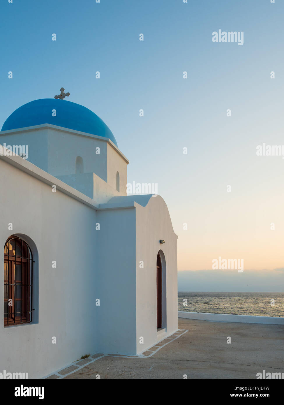 a typical church in the greek islands of Paros at sunrise Stock Photo ...