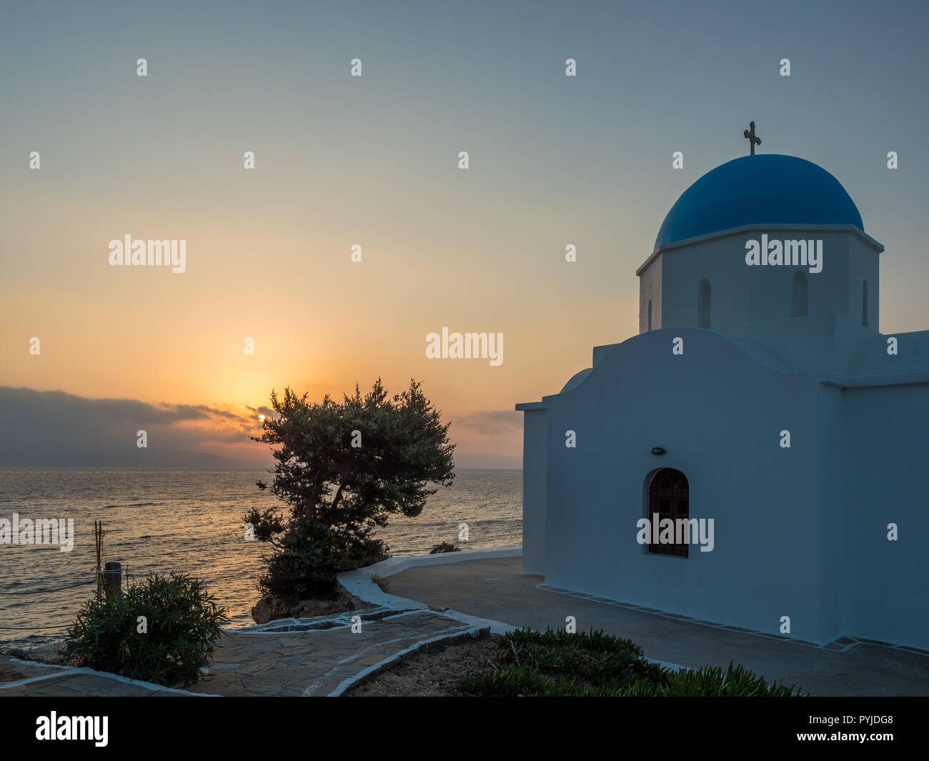 a typical church in the greek islands of Paros at sunrise Stock Photo ...