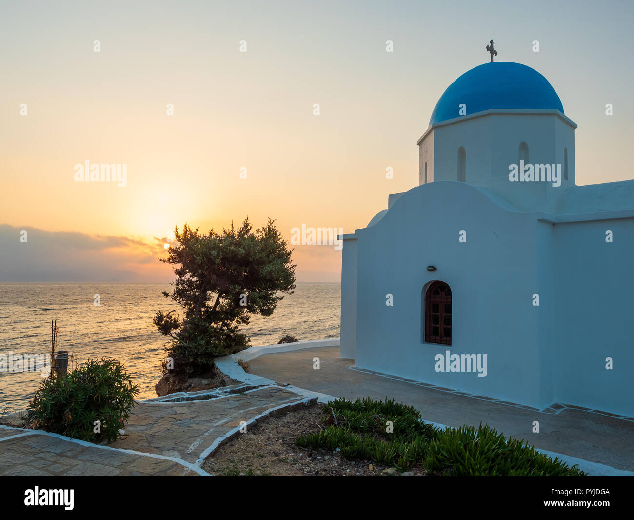 a typical church in the greek islands of Paros at sunrise Stock Photo ...