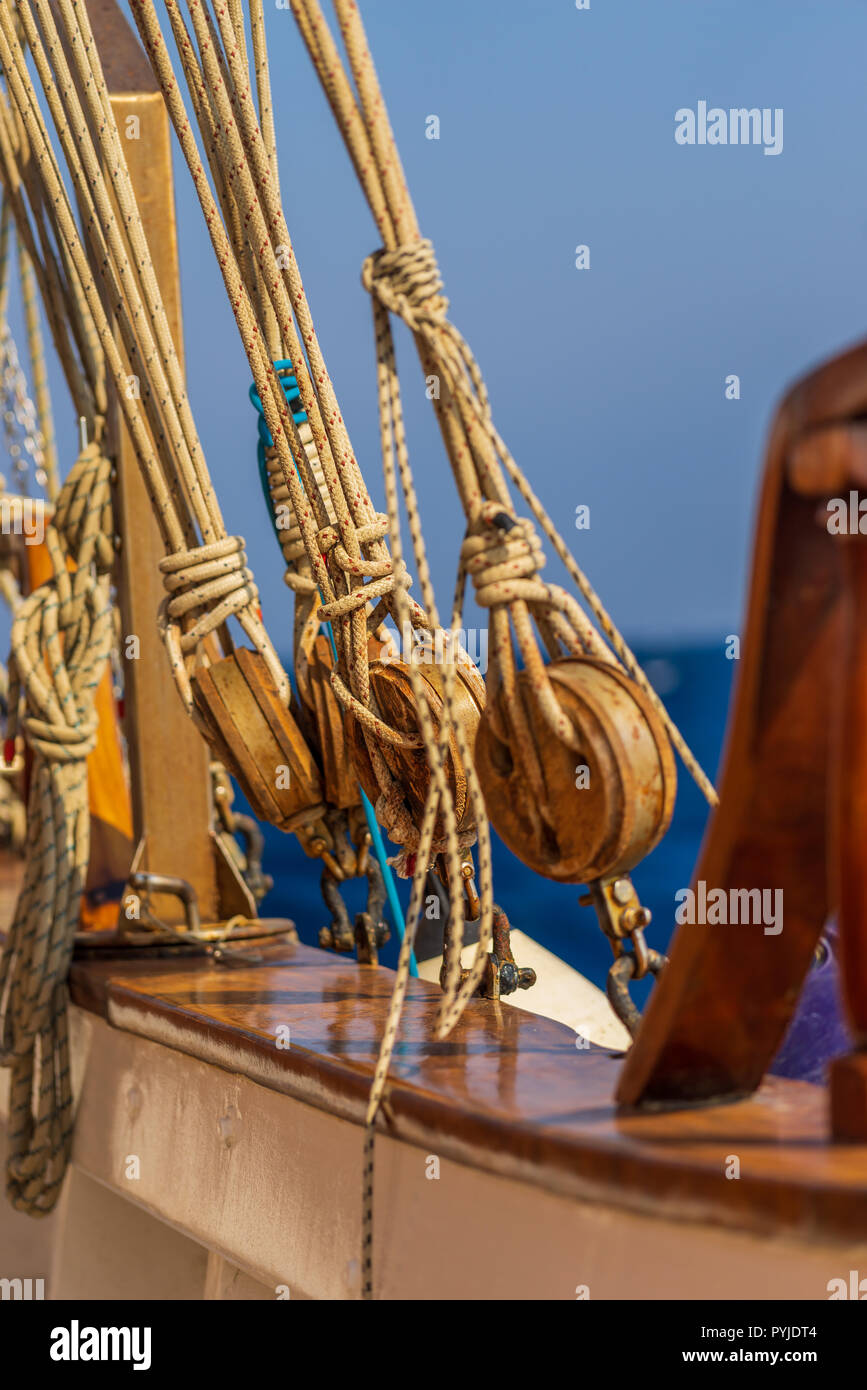 Old ship tackles. Old sailing ship vessel. Background Stock Photo - Alamy