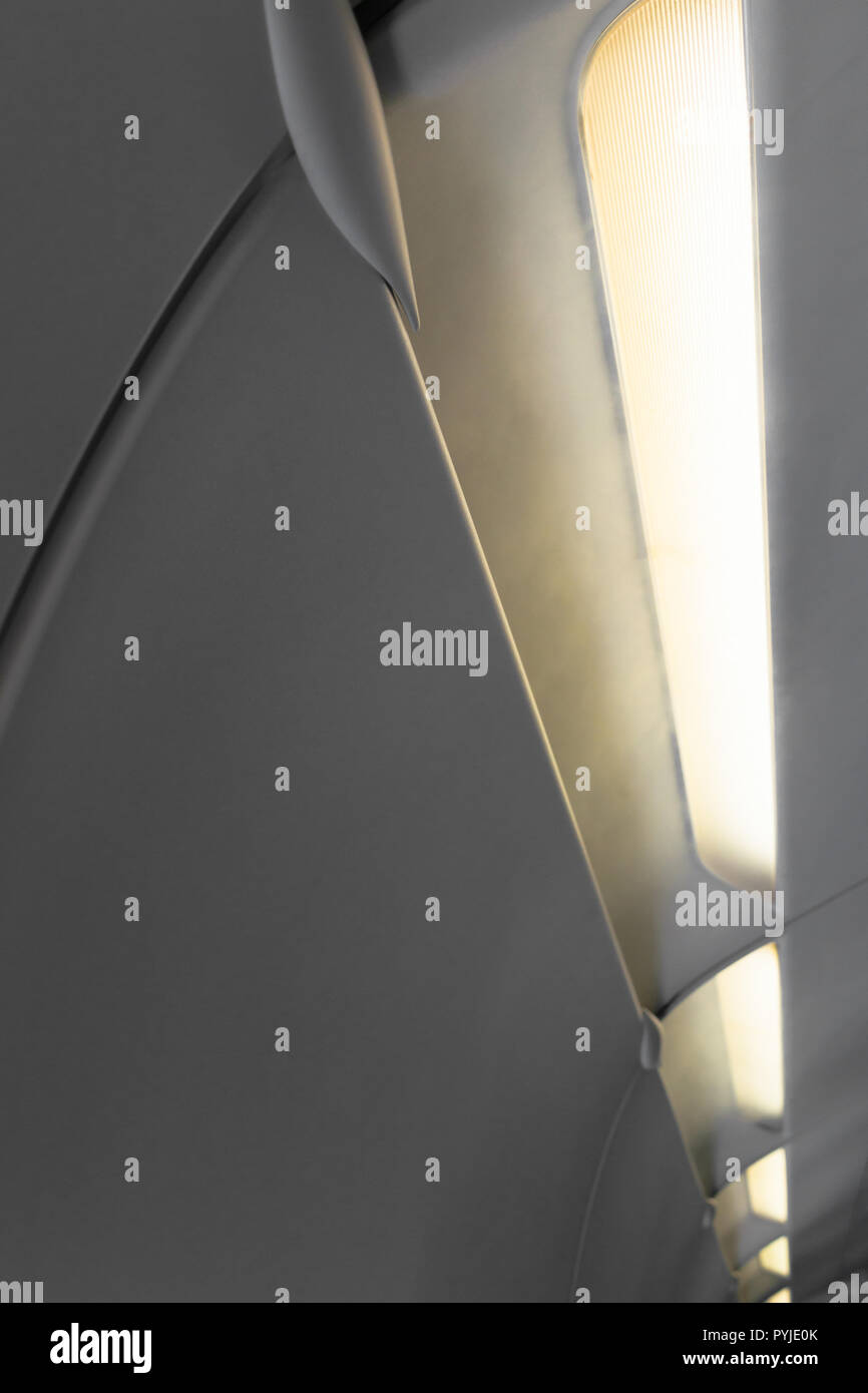 Lights and water diffusers in plane cockpit over the passengers seats ...