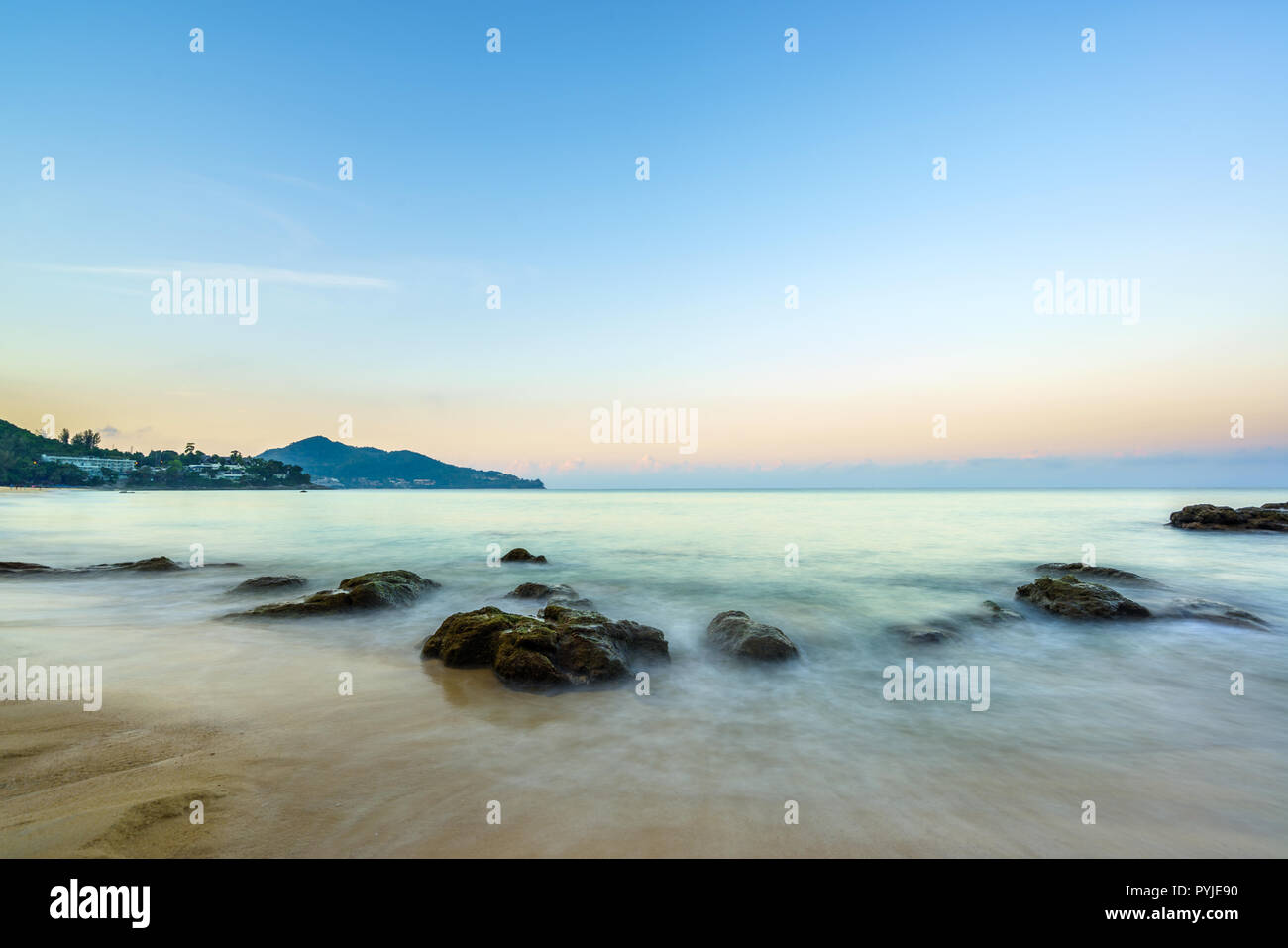 Beautiful Tropical beach at sunset at summer resort Stock Photo - Alamy
