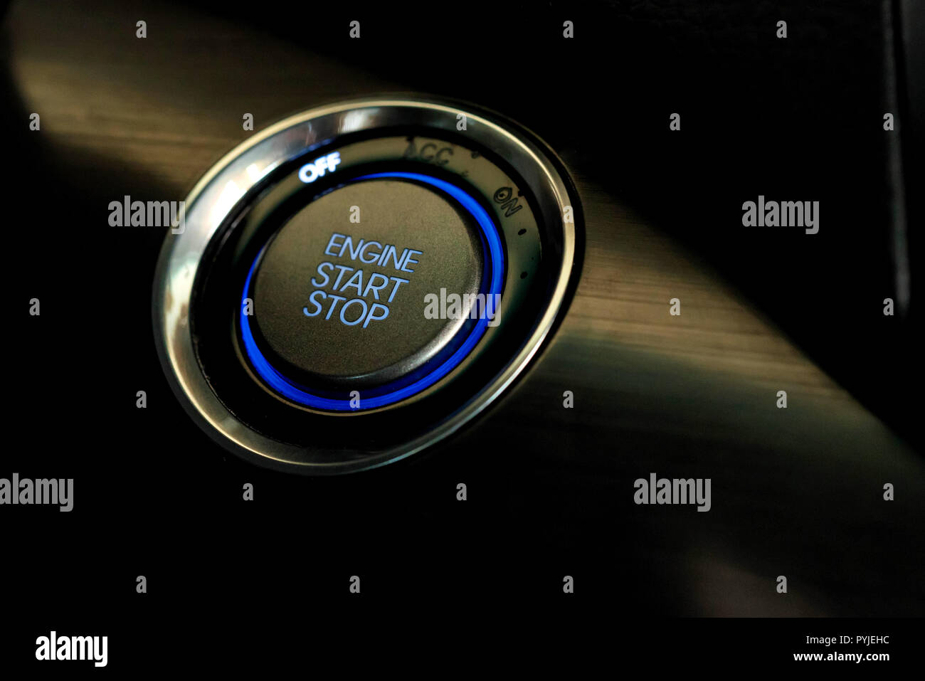 Engine start button in modern car close Stock Photo - Alamy