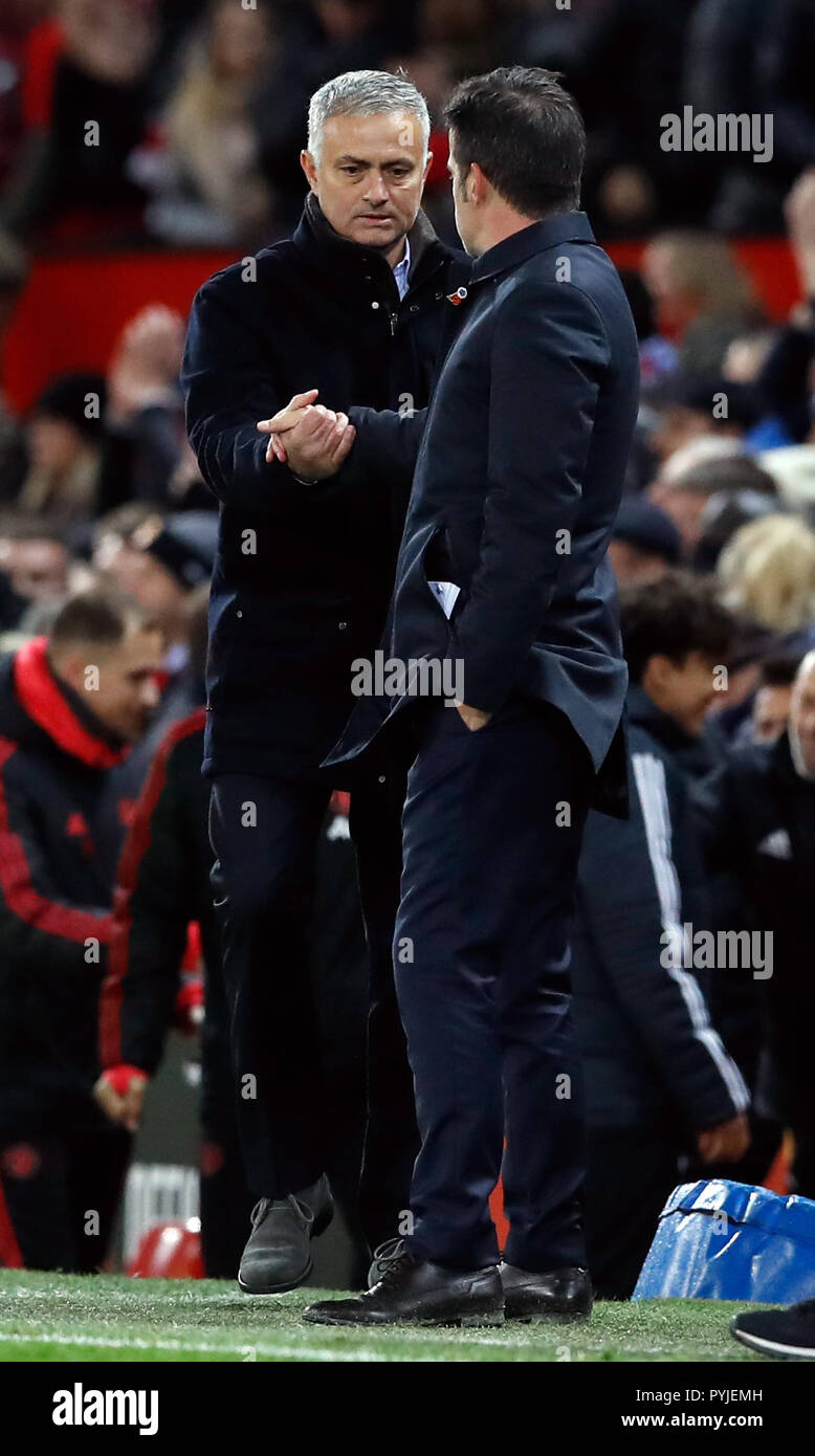 Manchester United manager Jose Mourinho (left) and Everton manager ...